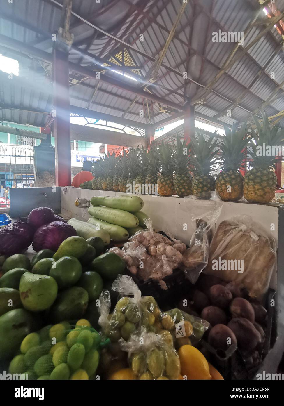 Victoria, Seychelles. 11th Mar, 2025. A stall selling fruit and ...