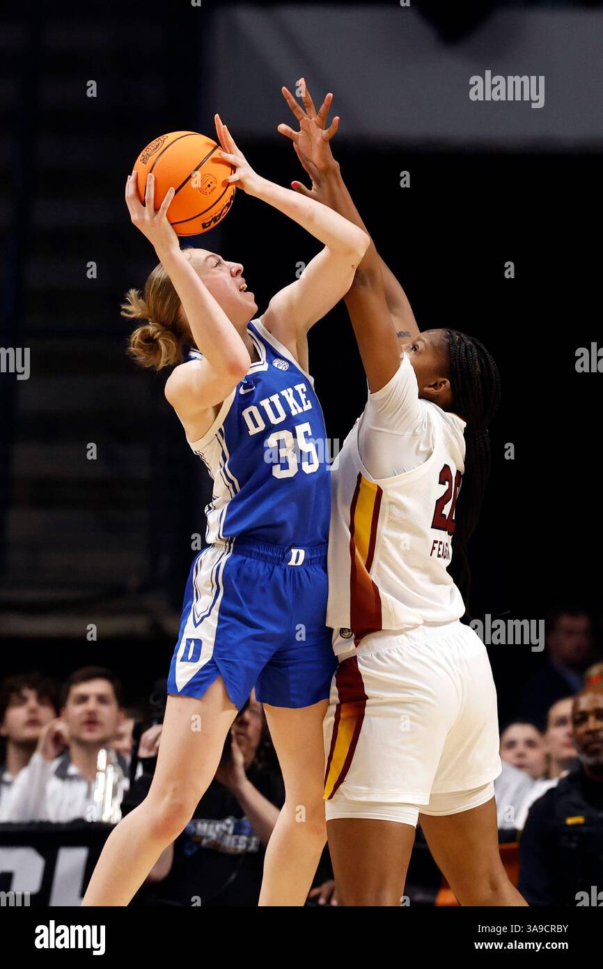Duke forward Toby Fournier (35) puts up a shot over South Carolina forward Sania Feagin (20 ...