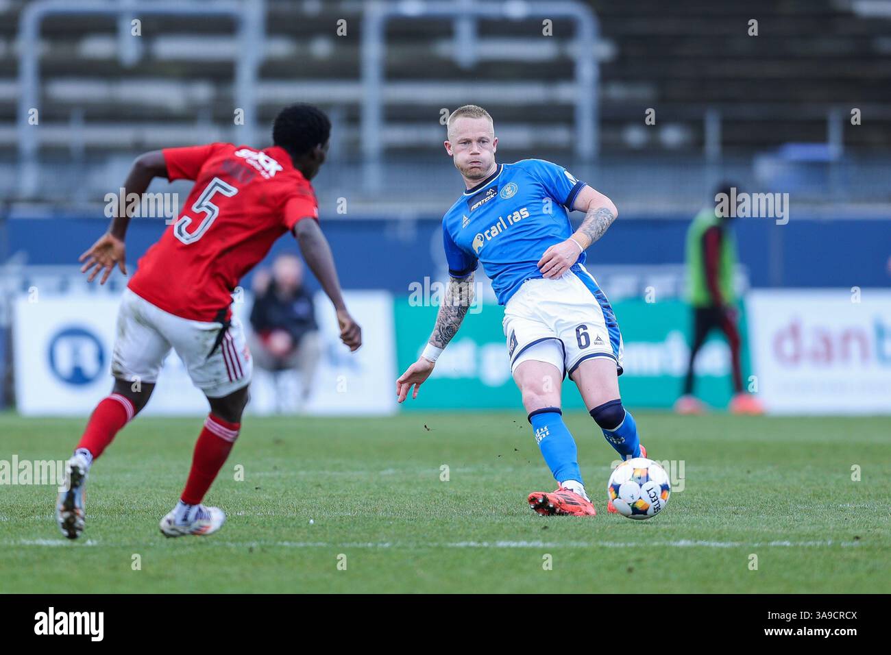Lyngby, Denmark. 30th Mar, 2025. Rasmus Thelander (6) of Lyngby BK seen ...