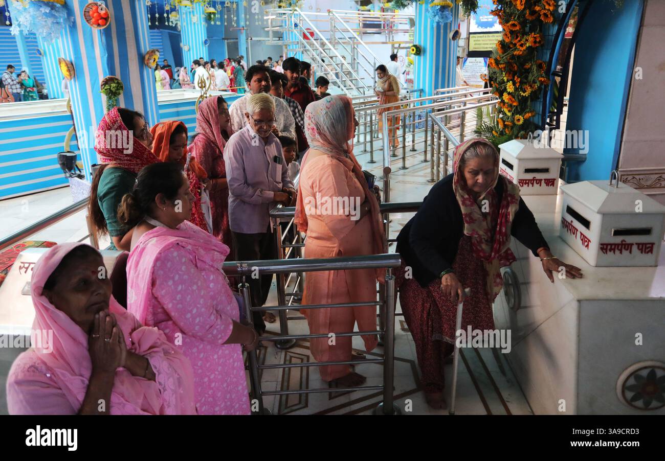 Indian devotees offer prayers during the Hindu Navaratri festival at ...
