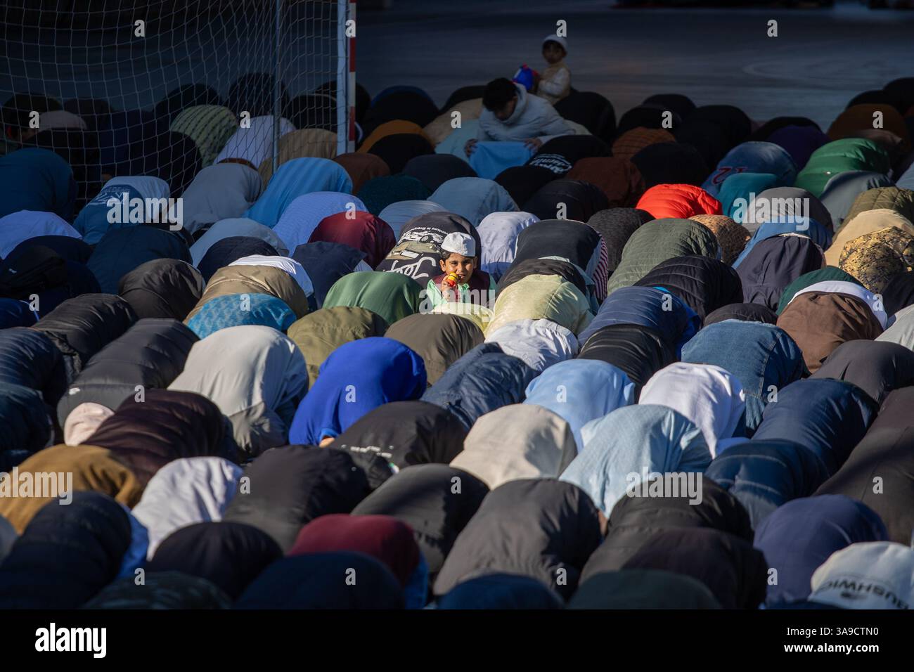 Madrid, Spain. 30th Mar, 2025. Muslims perform Eid al-Fitr prayers to ...