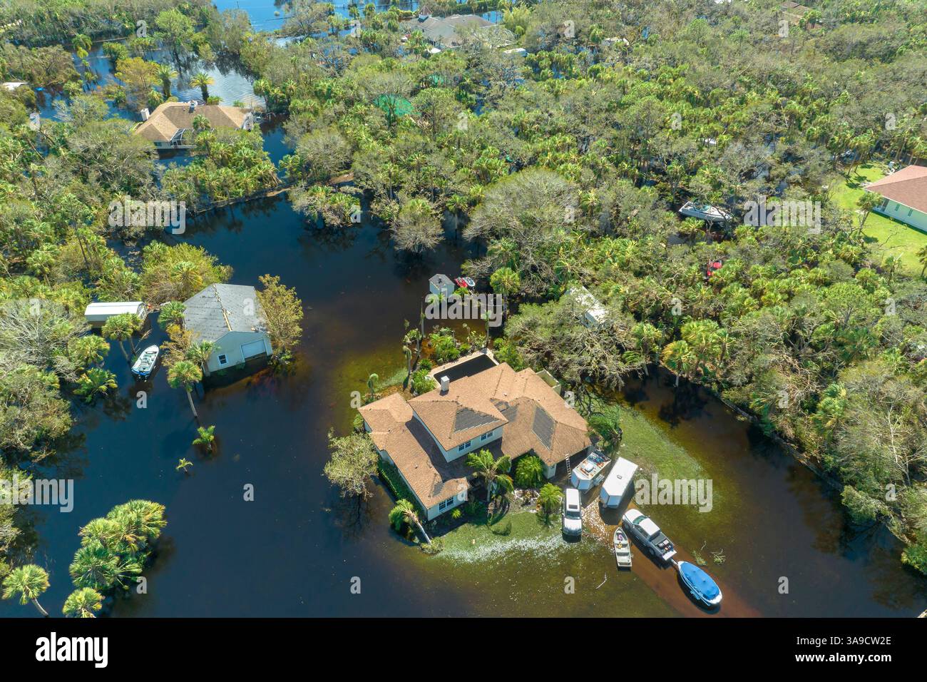 Aftermath of natural disaster. Surrounded by hurricane Ian rainfall ...
