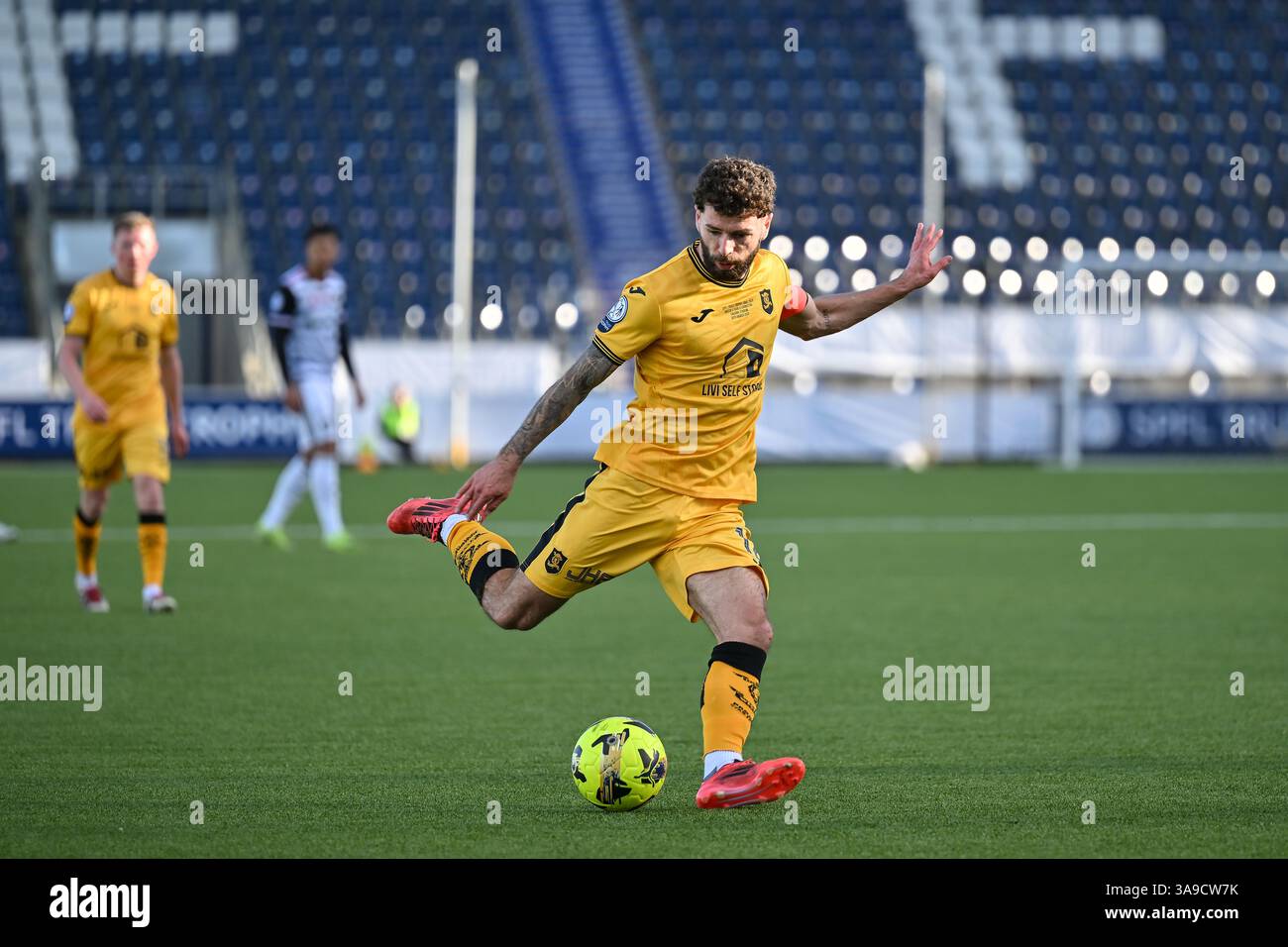 Falkirk, Scotland, UK. 30th March, 2025. Livingston captain Jamie ...