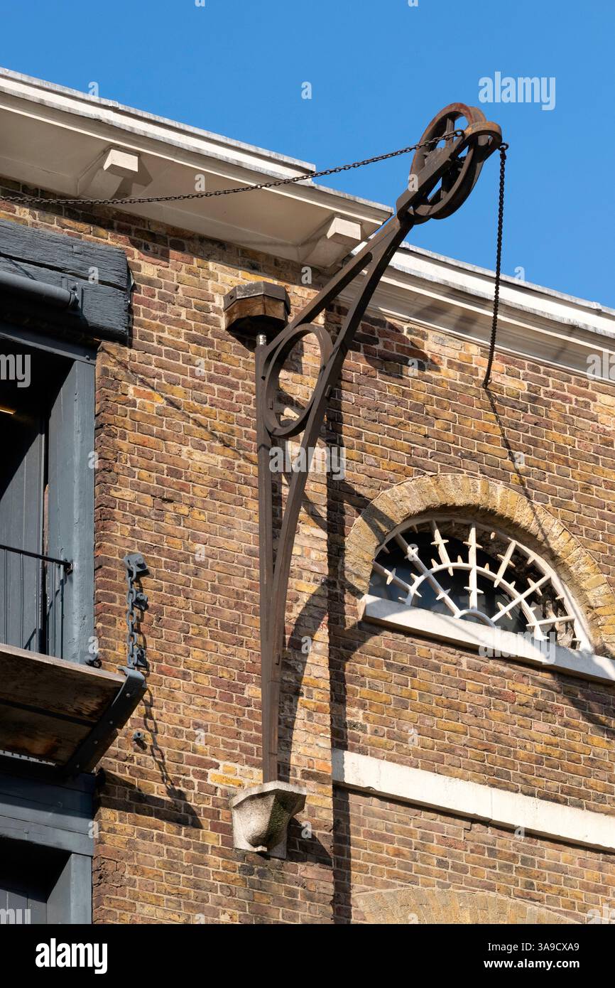 LONDON, UK - MARCH 26, 2025: A vintage industrial pulley on a Victorian ...