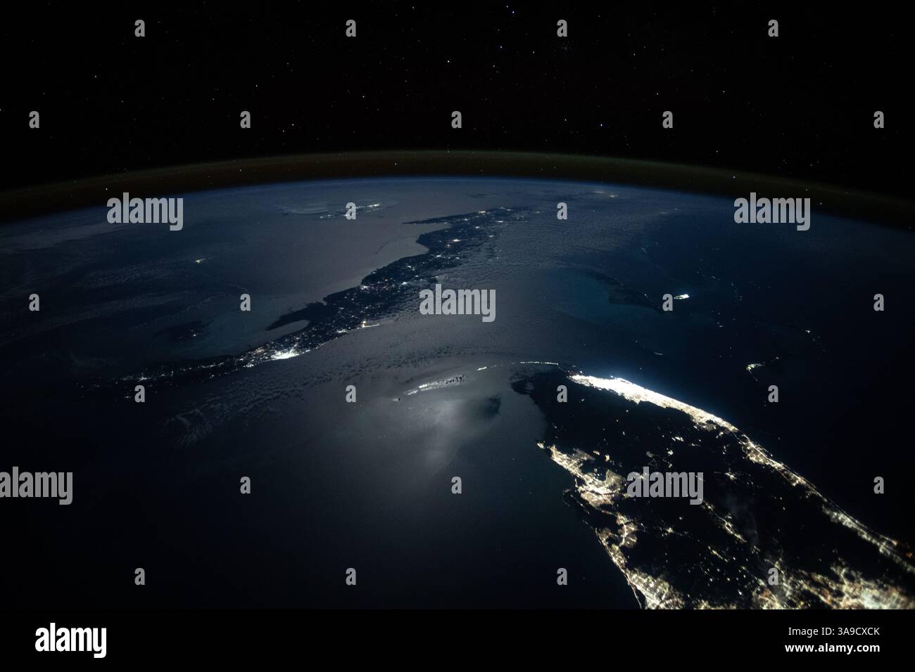 Florida and Cuba, satellite view at night. Digital enhancement of an ...