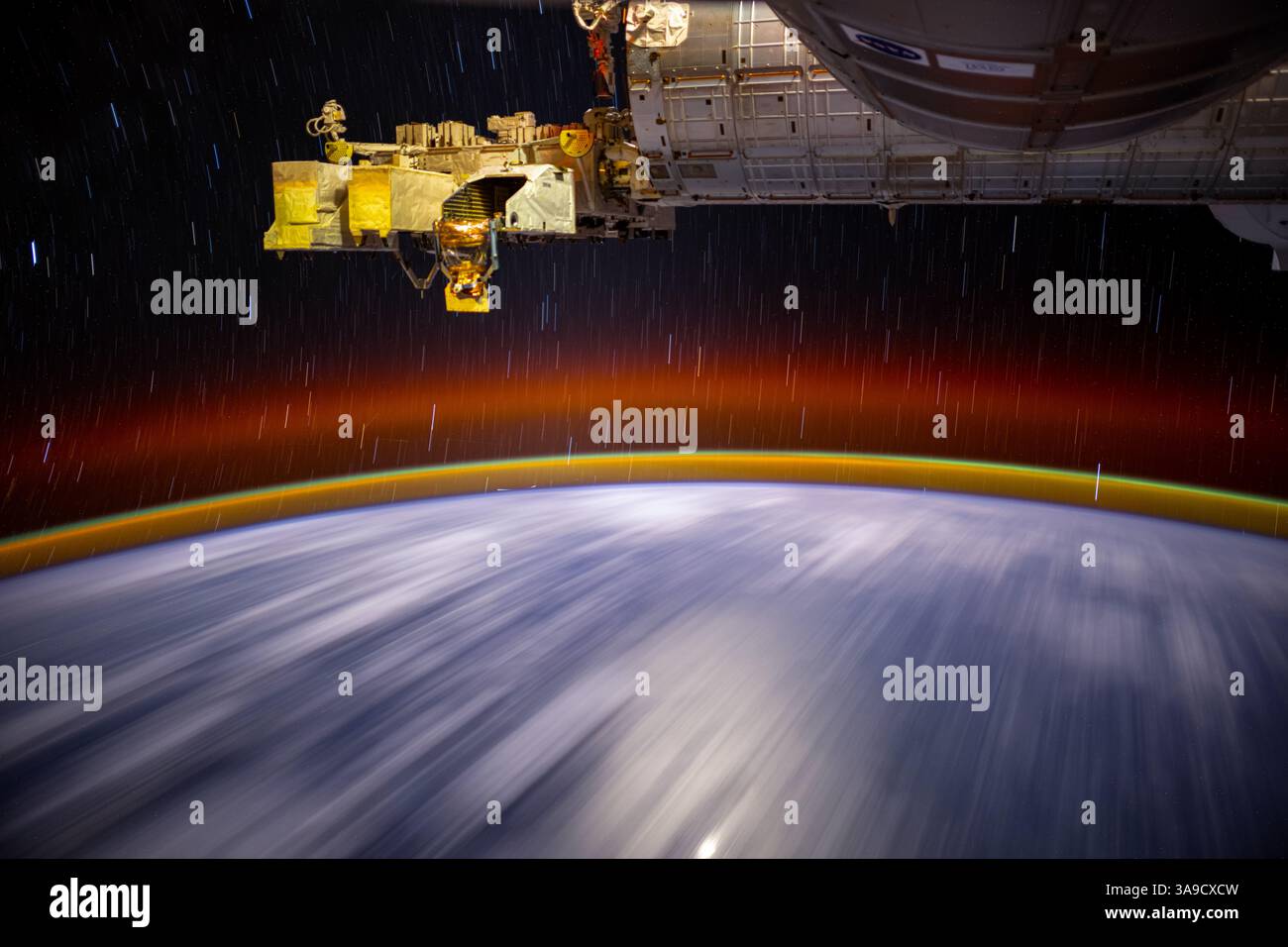 Long exposure of Planet Earth and the ISS. Digital enhancement of an ...