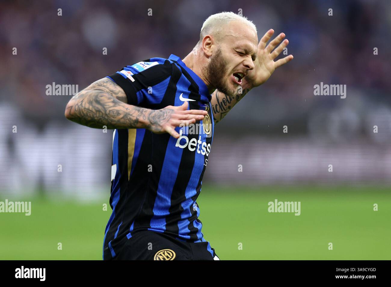 Milano, Italy. 30th Mar, 2025. Federico Dimarco of Fc Internazionale looks dejected during the ...