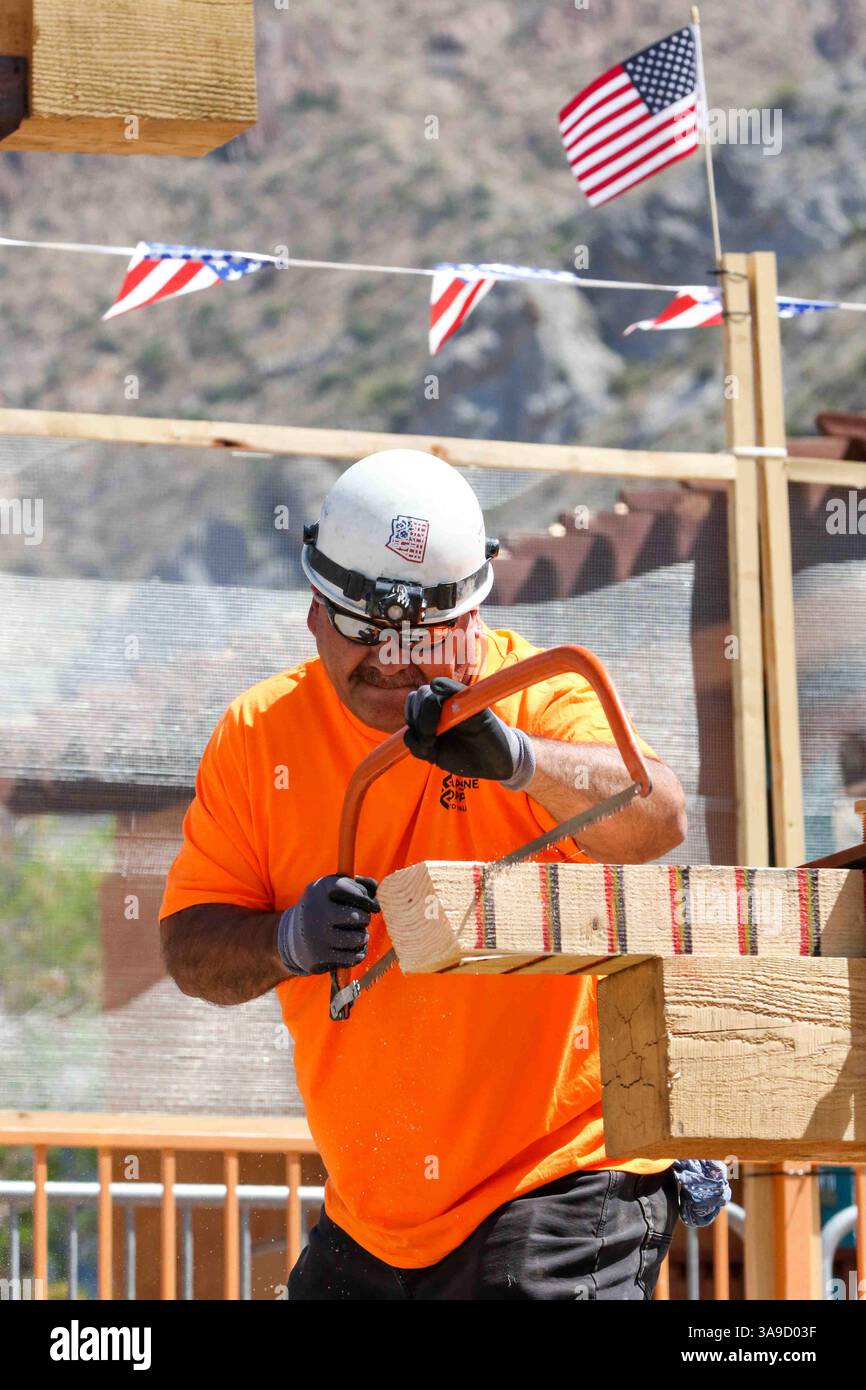 Superior, USA. 29th Mar, 2025. Contestants compete at the hand sawing ...