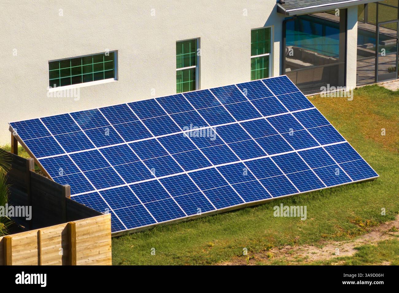 Private home with solar photovoltaic panels mounted on stand-alone ...