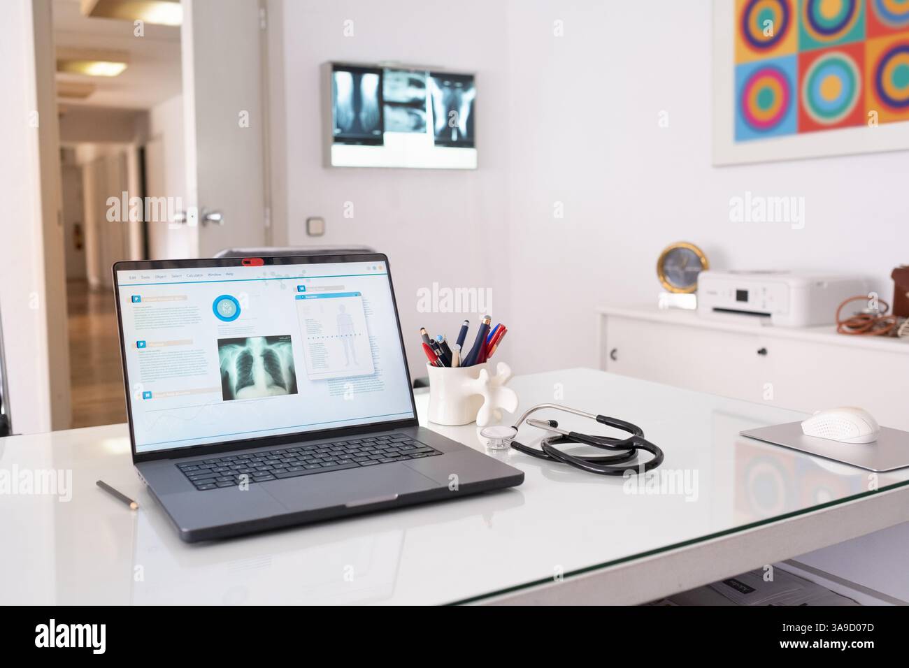 A doctor's consultation desktop. You can see the screen of the p c ...