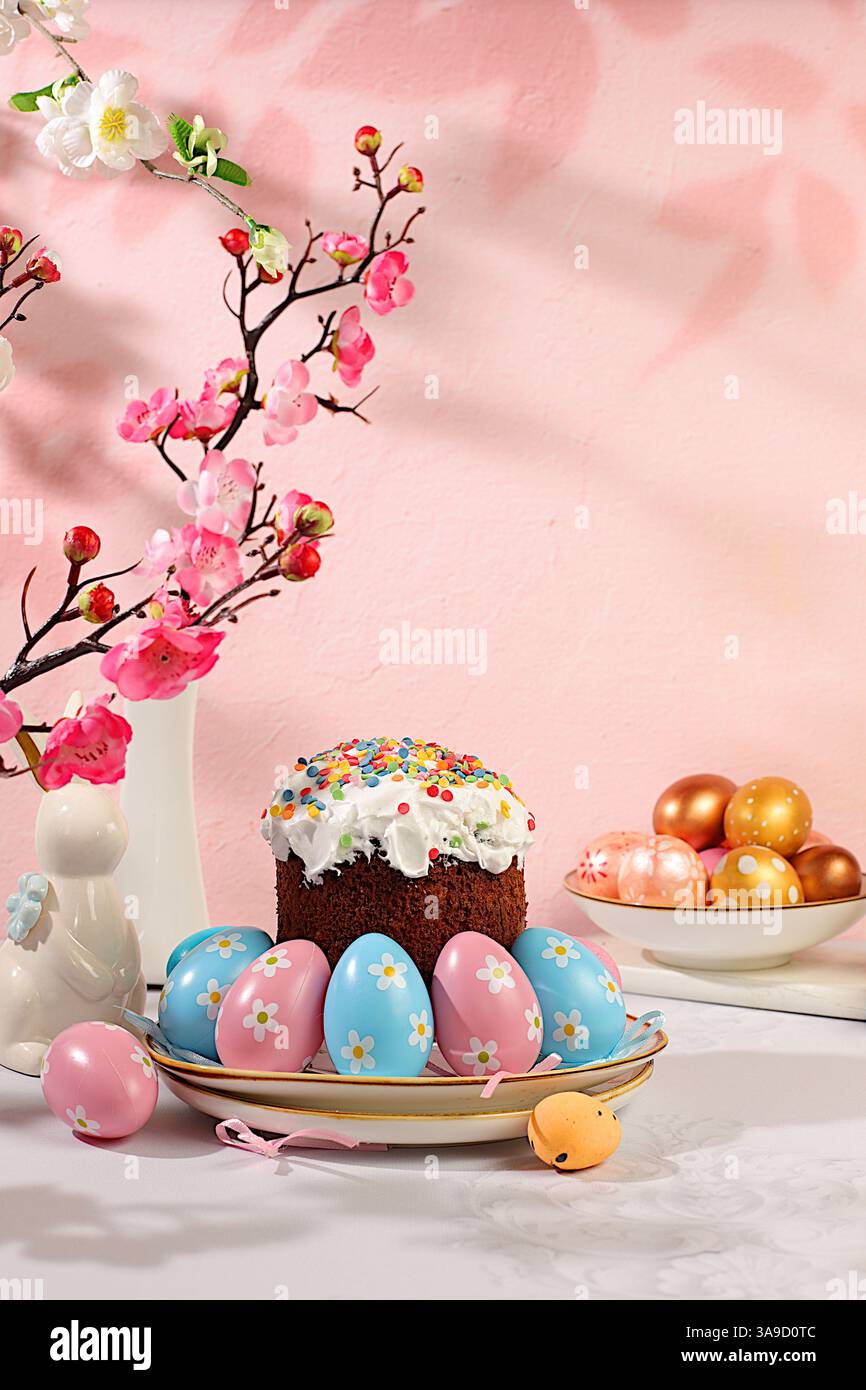 Traditional Easter cake and marble Easter eggs painted with golden ...