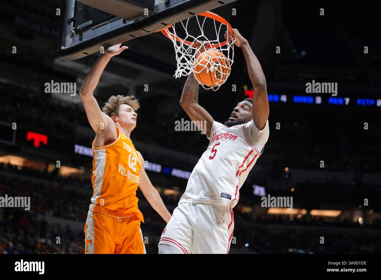 Houston's Ja'Vier Francis (5) dunks as Houston's Jacob McFarland (12 ...