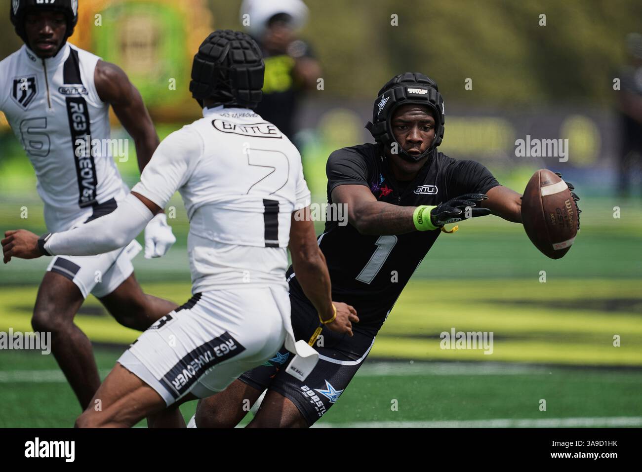 Coastline Stars wide receiver Zion Legree (1) extends for extra yards ...