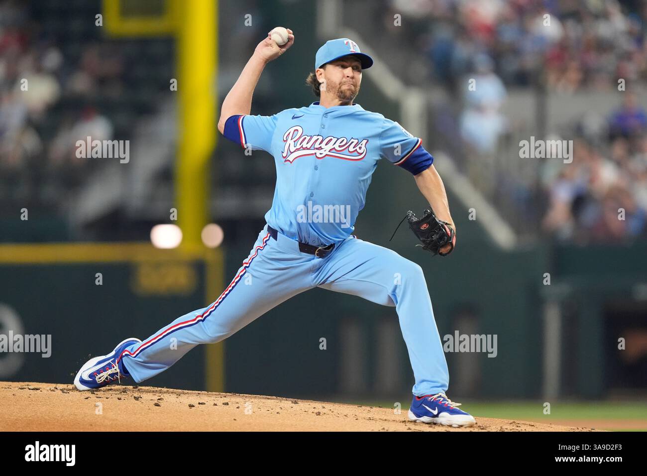 Texas Rangers starting pitcher Jacob deGrom throws during the first ...