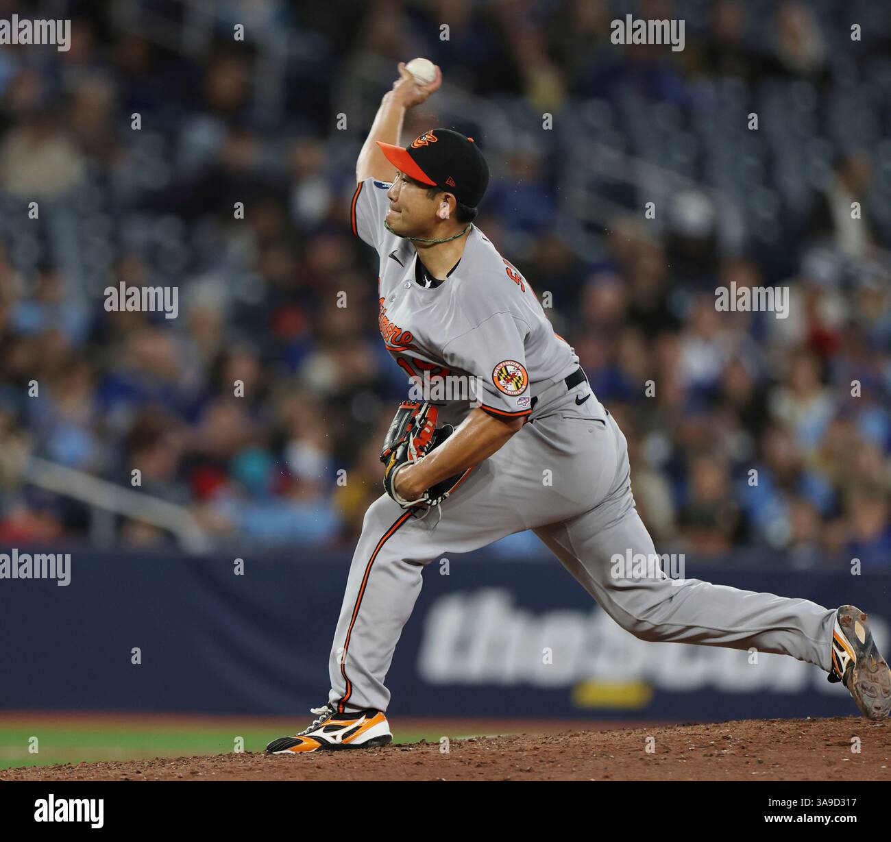 Baltimore Orioles starting pitcher Tomoyuki Sugano pitches in the ...