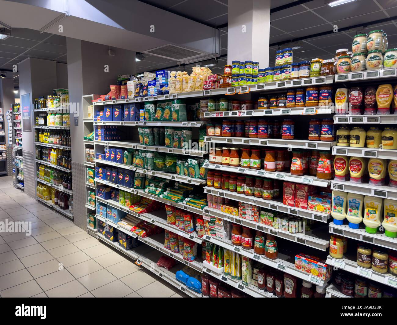 Grocery aisle filled with a variety of food products in a modern ...