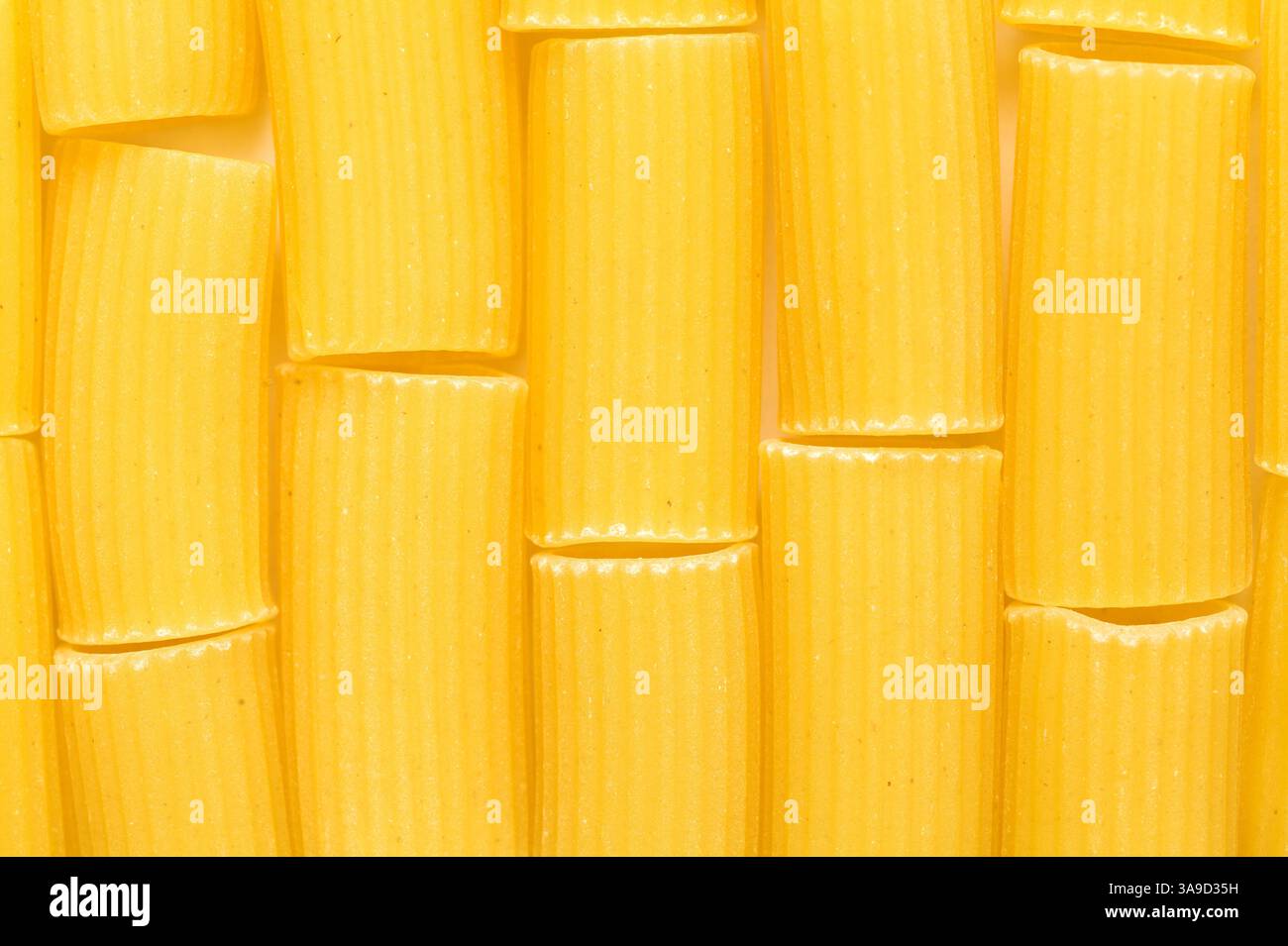 Rigatoni, tube shaped dry pasta with ridges Stock Photo - Alamy
