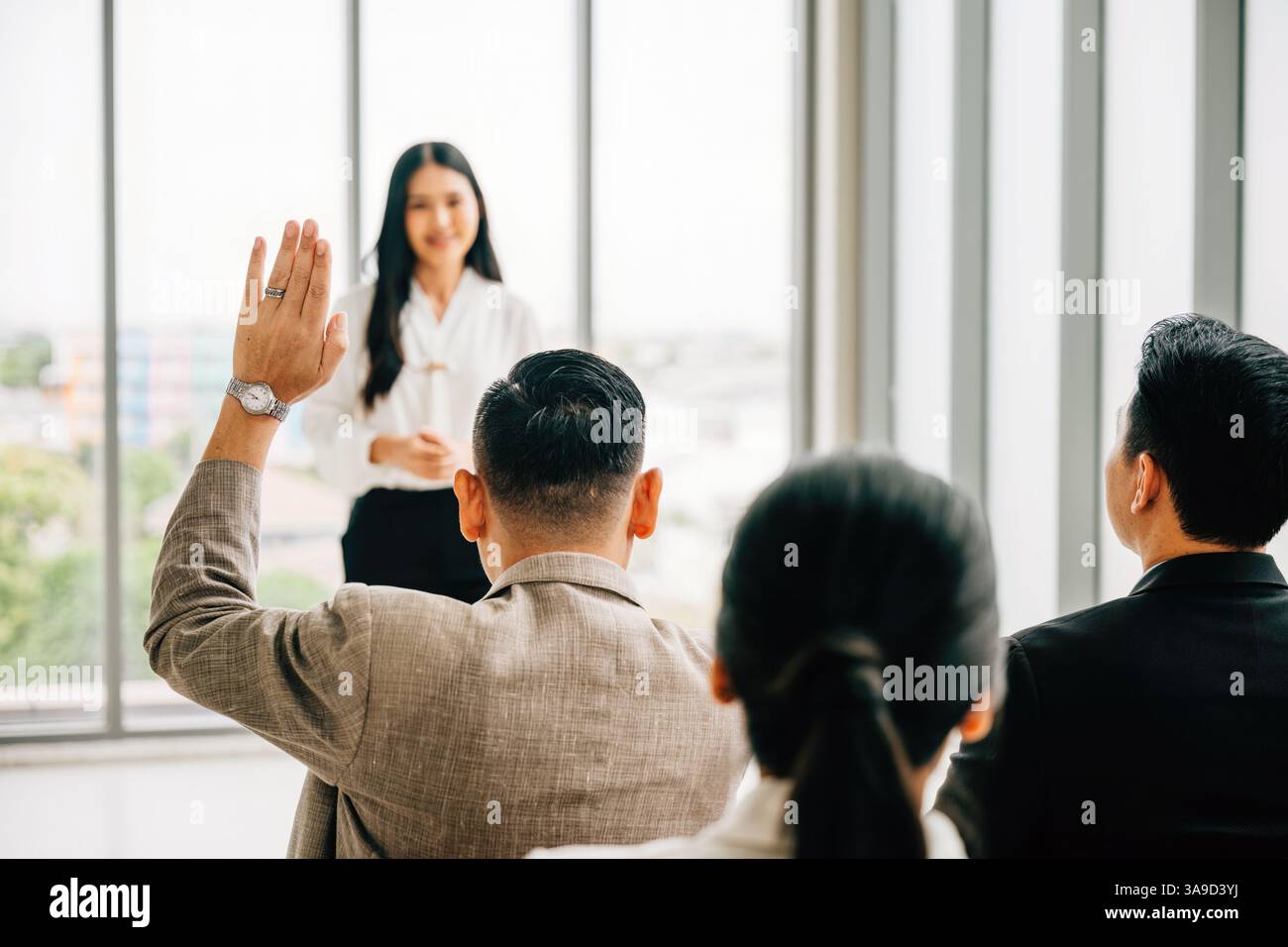 Active engagement is on display as a large group in a seminar classroom ...