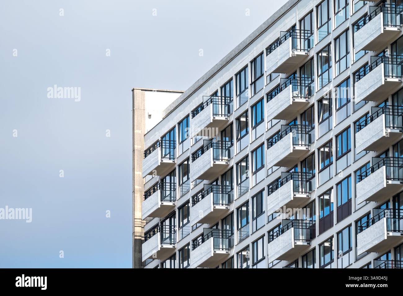 High rise apartment block with balconies, patterned archtecture in ...