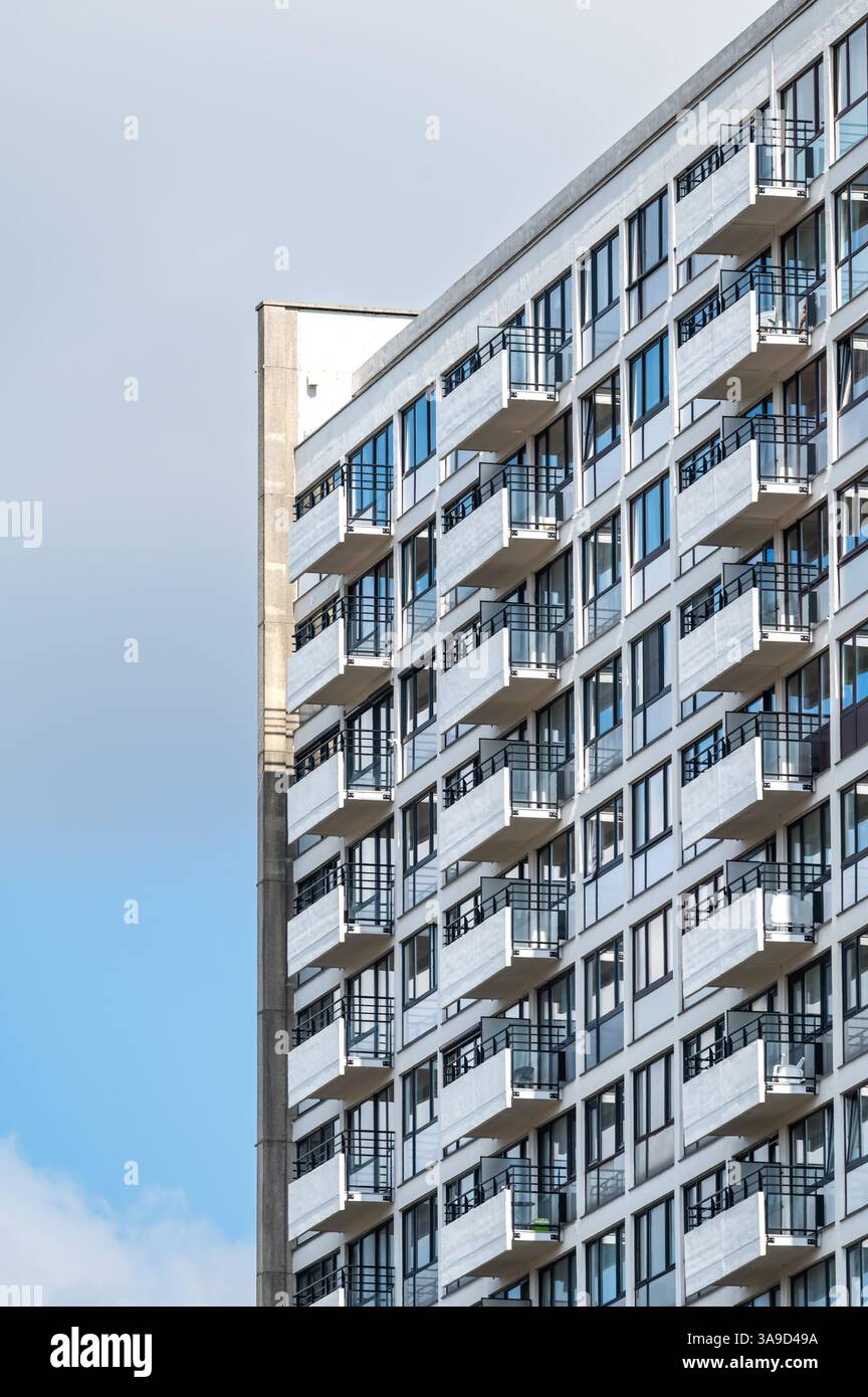 High rise apartment block with balconies, patterned archtecture in ...