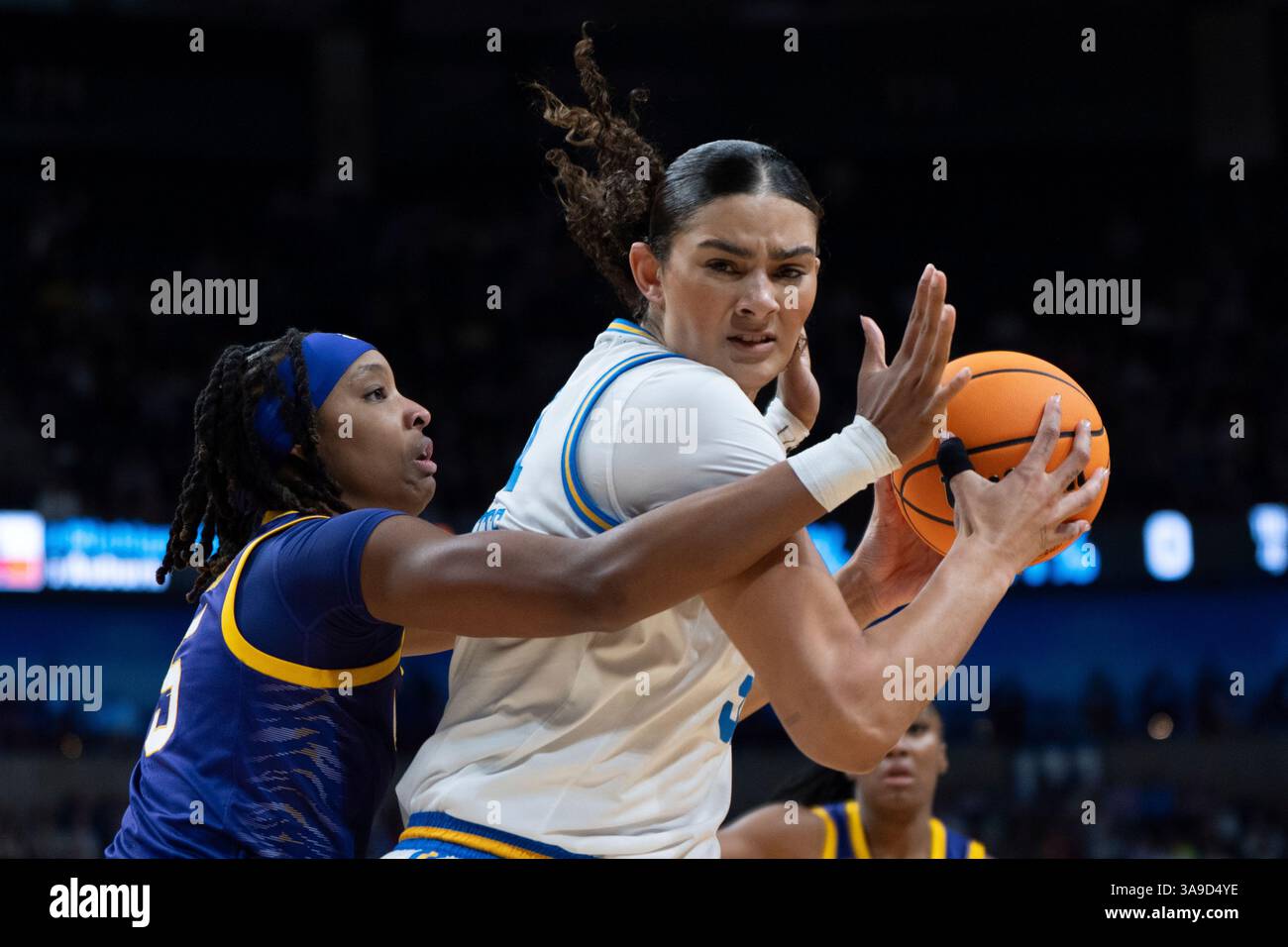 UCLA center Lauren Betts, right, tries to get around LSU forward Sa ...