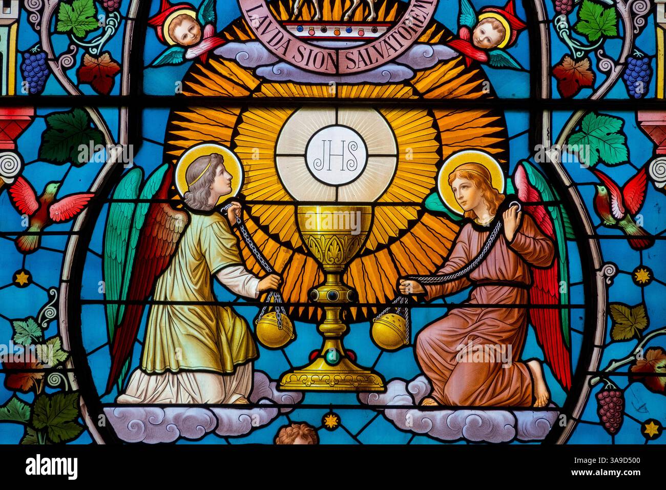 Abbatiale, Saint-Chef, France - 03-21-2025: Stained glass ((1912) of ...