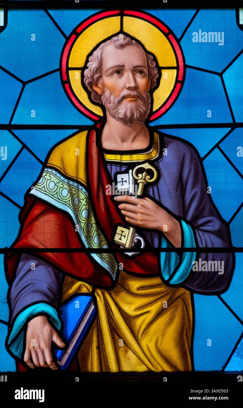 Saint-Chef, France - 03-21-2025: Stained glass ((1912) of Saint Peter ...