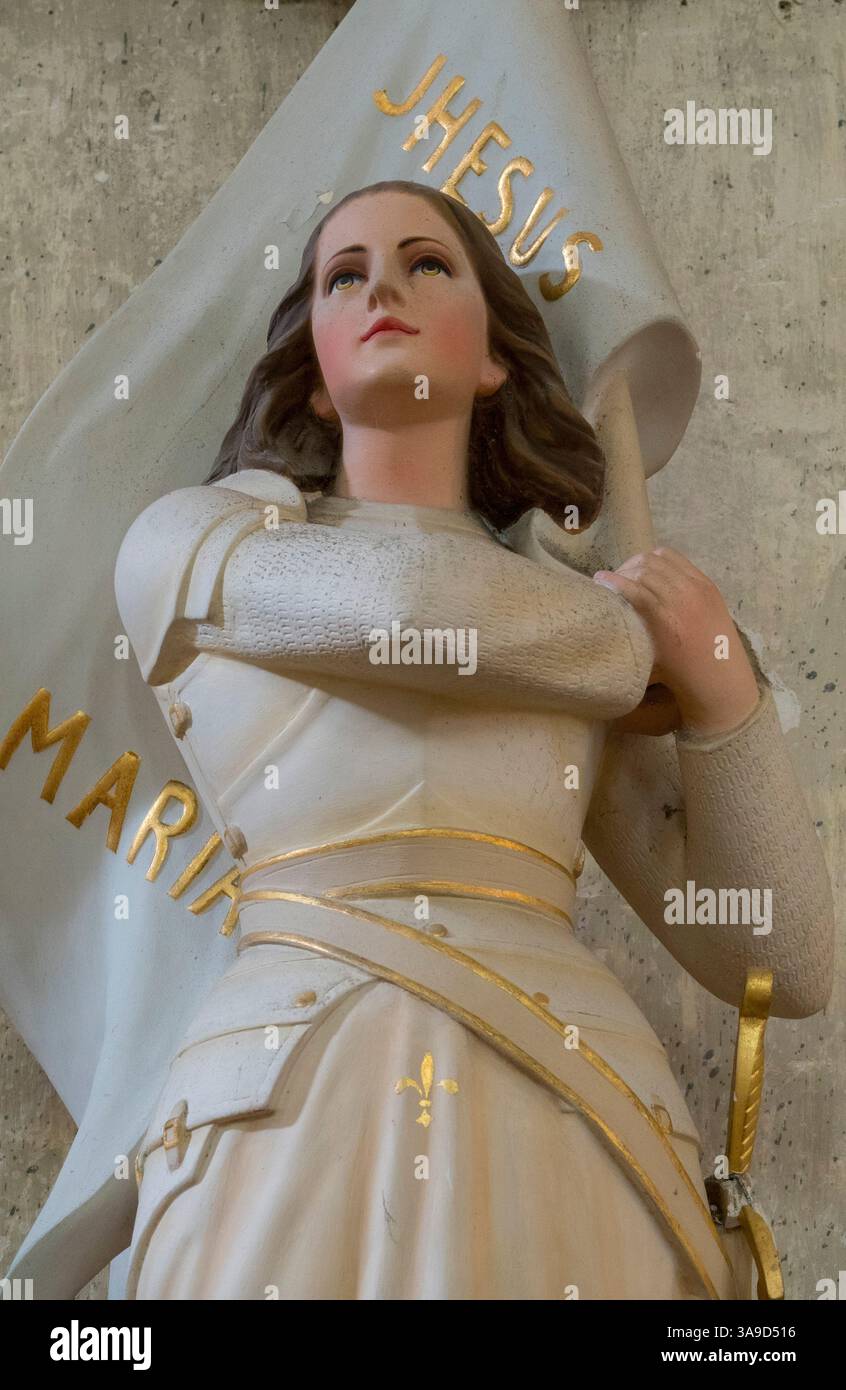 Saint-Chef, France - 03-21-2025: Statue (19th century) of Saint Joan of Arc or Sainte Jeanne d ...