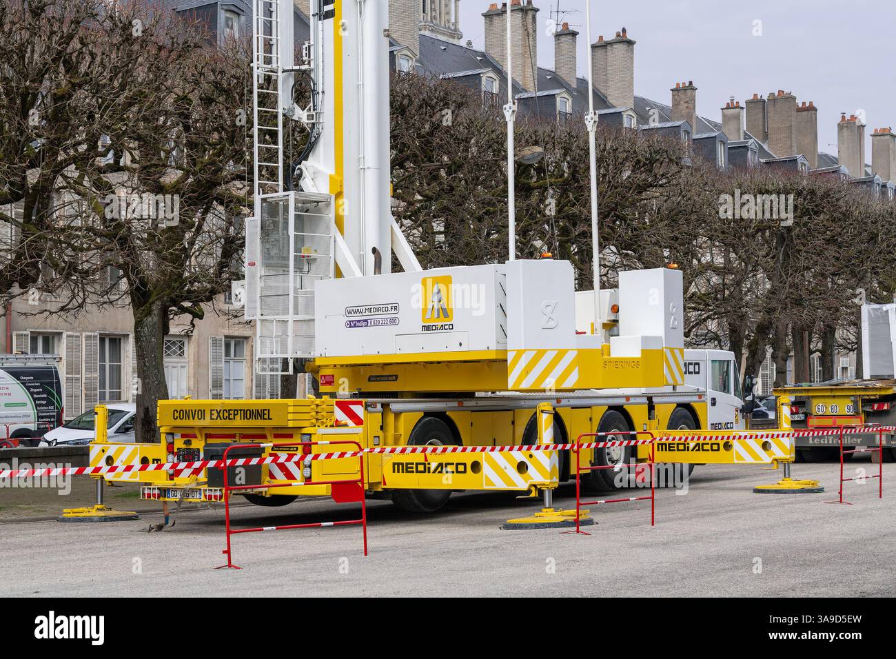 Nancy, France - View on a white and yellow mobile construction crane Spierings SK597-AT4 eLift ...