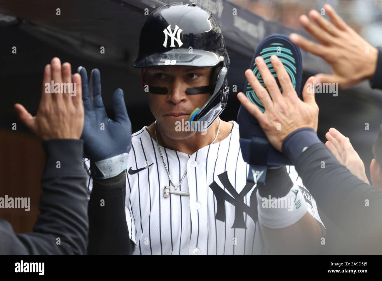 New York Yankees' Aaron Judge reacts after scoring on a wild pitch by ...