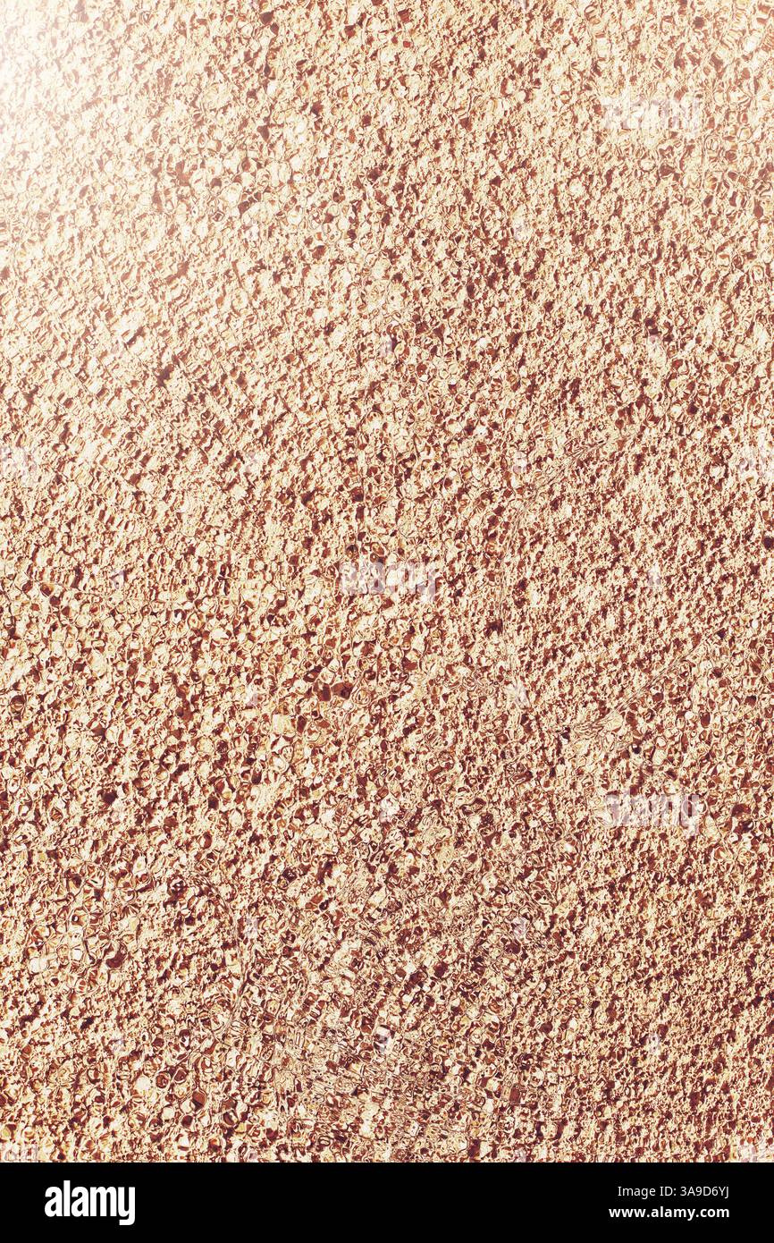 High-resolution golden stucco texture with an artistic glass filter ...