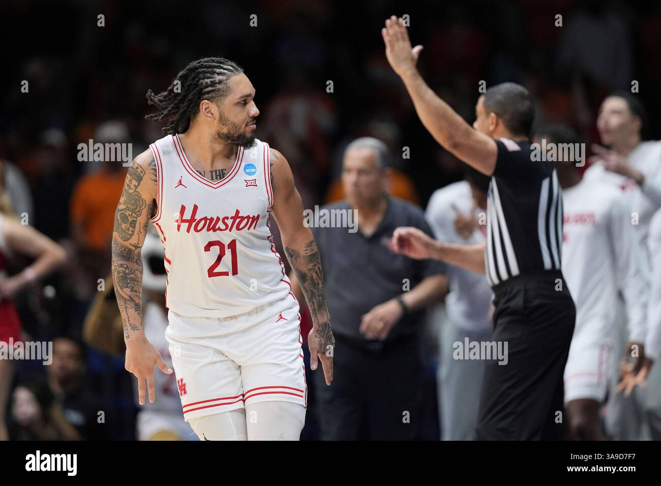 Houston's Emanuel Sharp (21) celebrates after scoring during the second ...