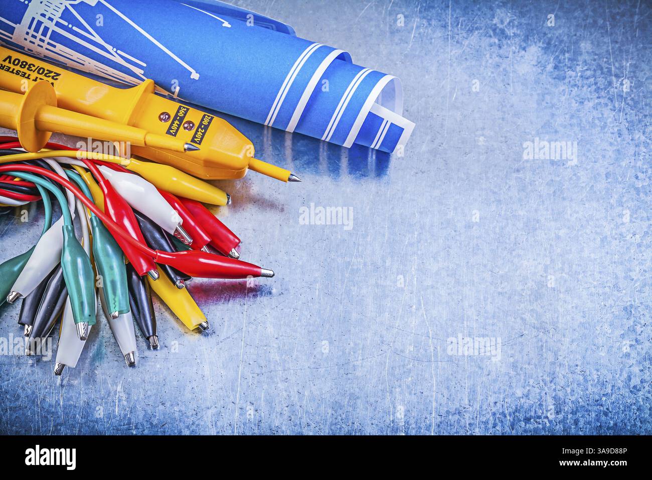 Yellow electrical tester crocodile cables set blue construction plans ...