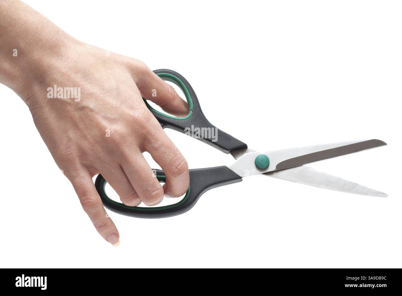 Feminine hand with scissors, plastic handles, steel blade Stock Photo ...