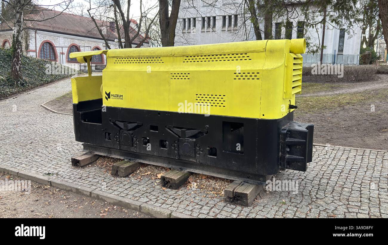 Old yellow diesel locomotive. Underground coal mine transport rail ...
