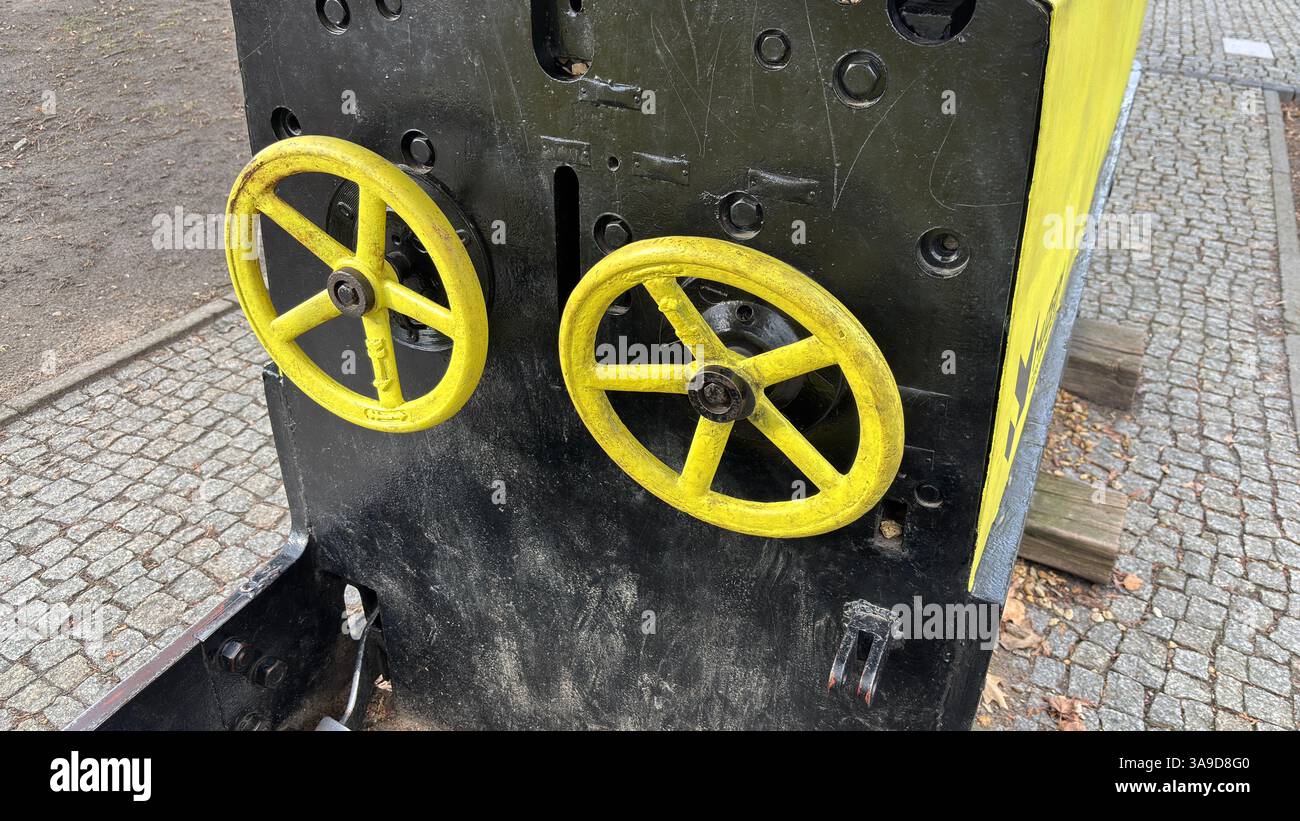 Old yellow diesel locomotive. Underground coal mine transport rail ...