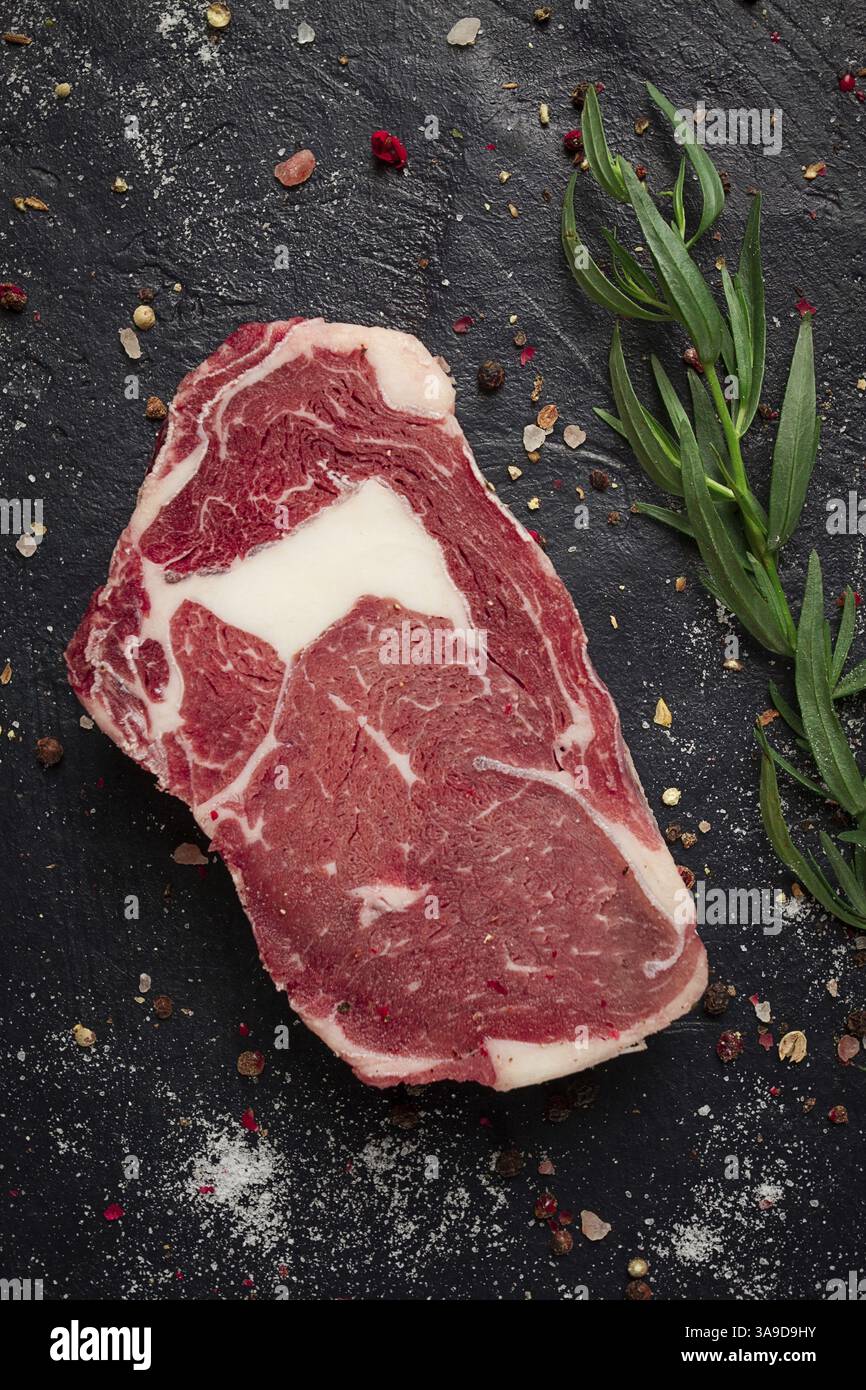 Fresh, raw rib eye steak, top view Stock Photo - Alamy