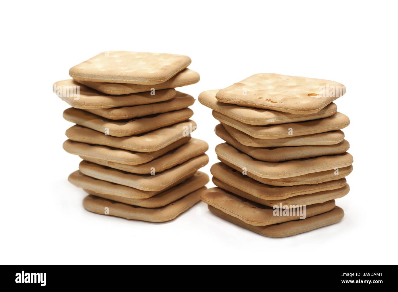 Crackers put by pile on white background Stock Photo - Alamy