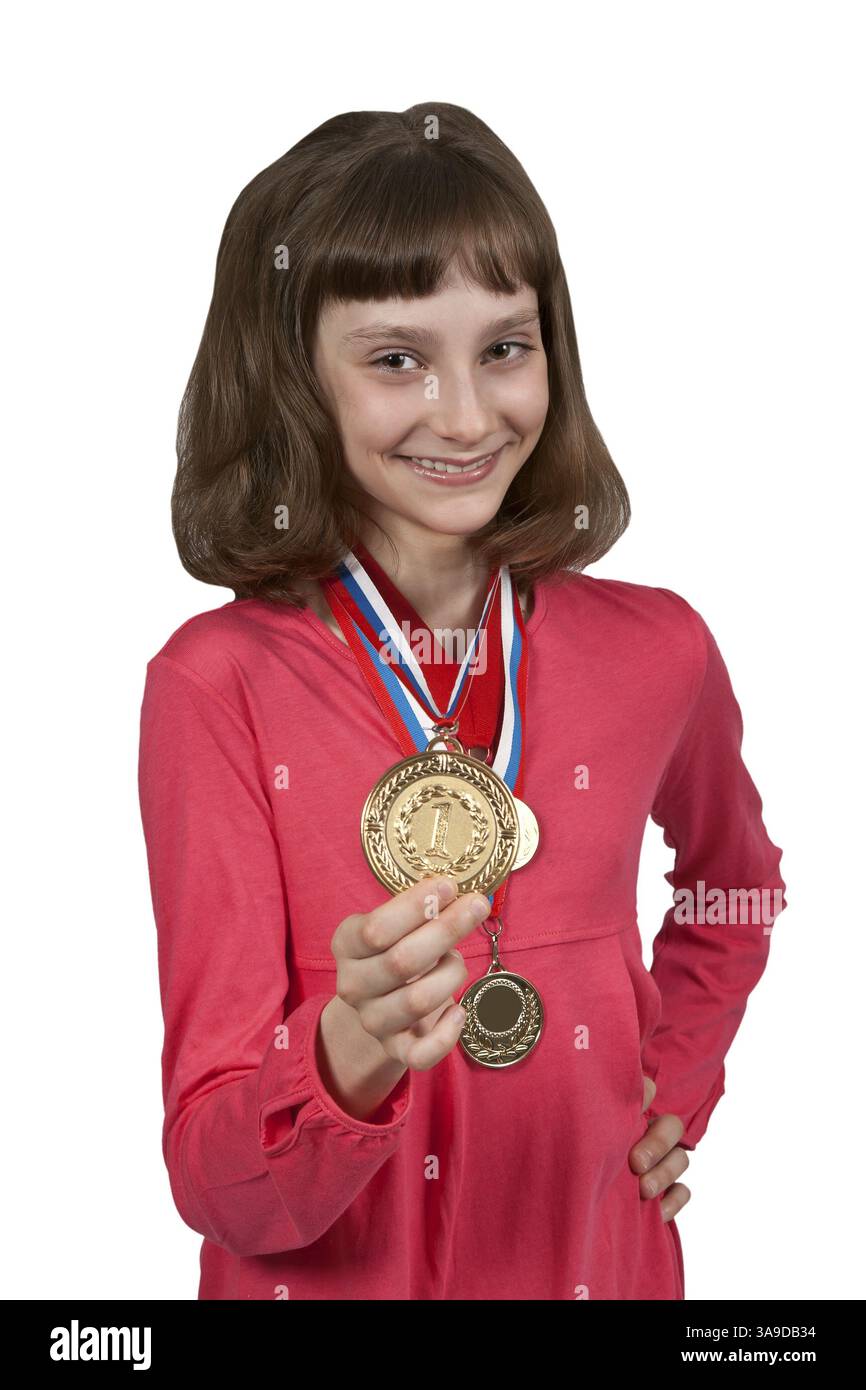 Girl shows gold medal winner isolated on a white background Stock Photo ...