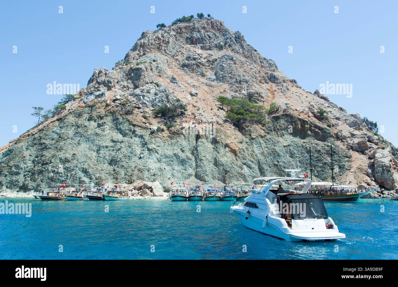 The scenic view of Suluada uninhabited island surrounded by different ...