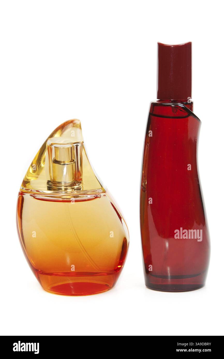 Two perfume bottle isolated on white background Stock Photo - Alamy
