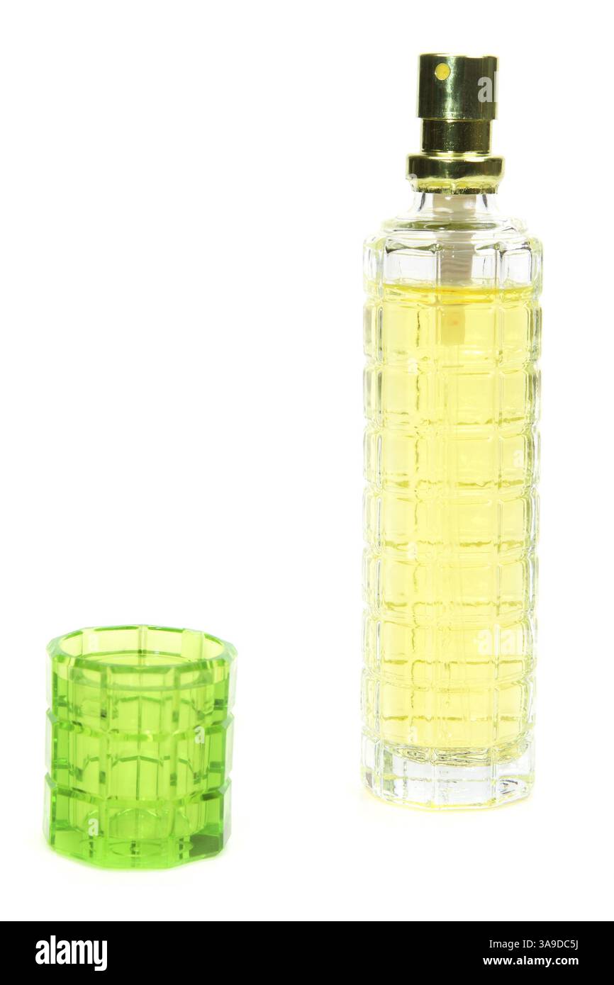 Yellow perfume bottle isolated on white background Stock Photo - Alamy