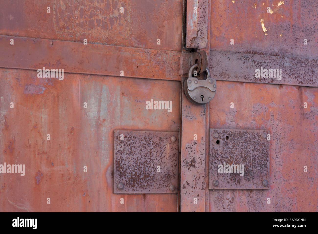 Lock hangs on iron hi-res stock photography and images - Alamy