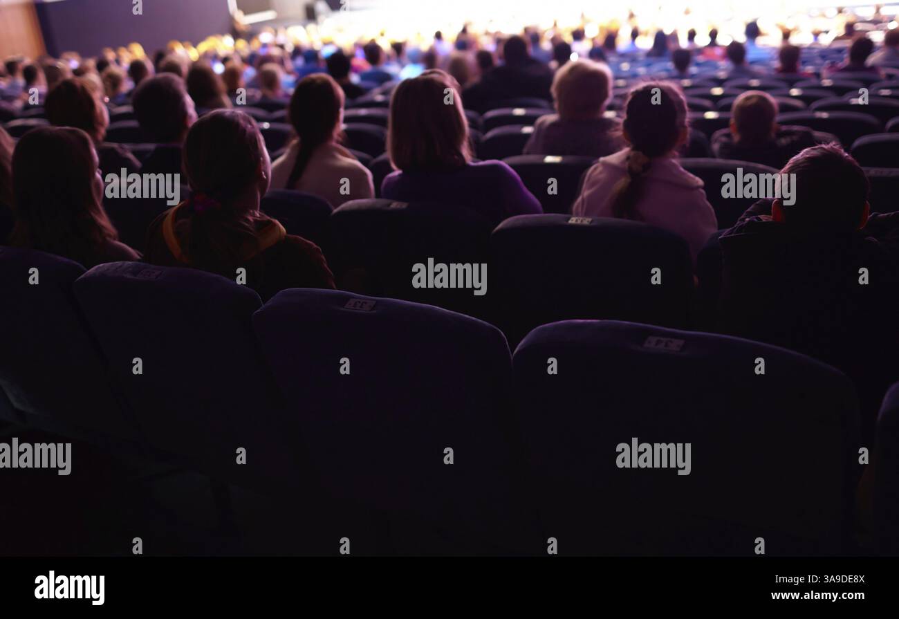 Viewers watching the show. Long exposure shot Stock Photo - Alamy