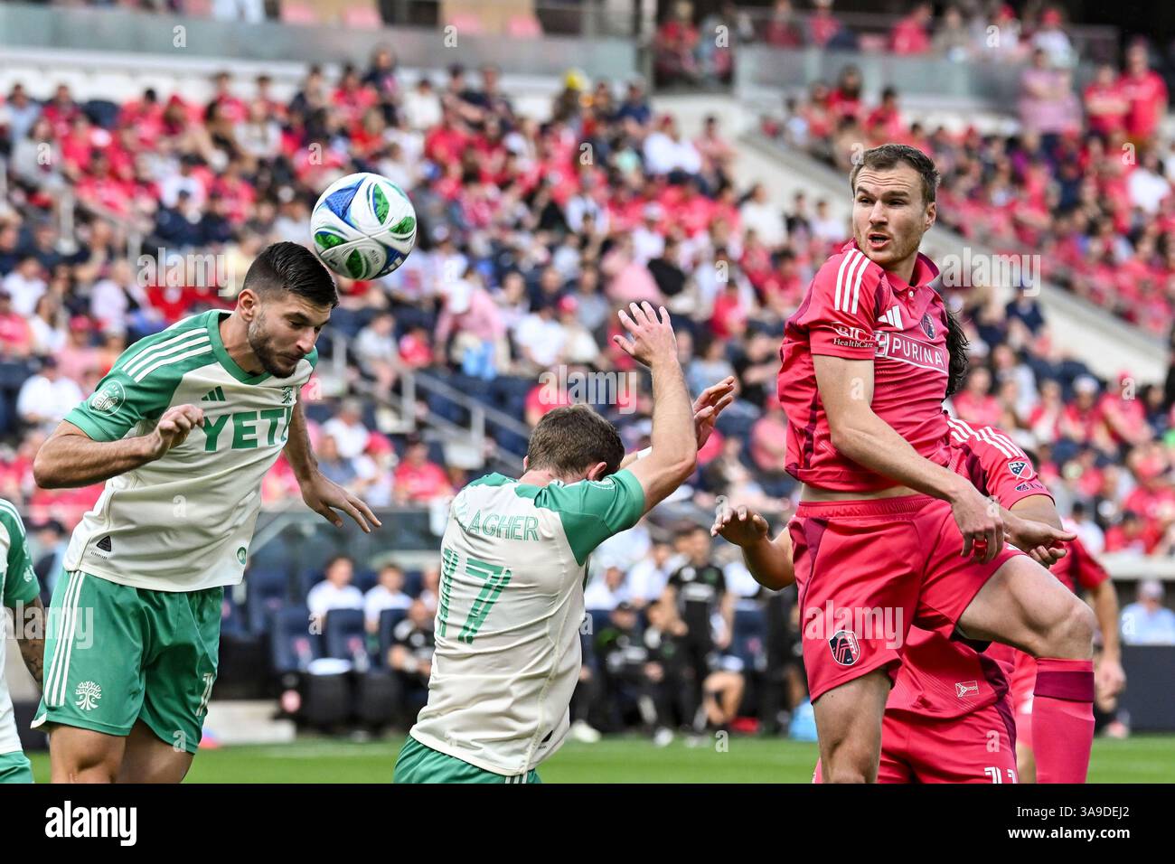 ST. LOUIS, MO - MARCH 30: Brendan Hines-Ike (4) of Austin FC heads the ...
