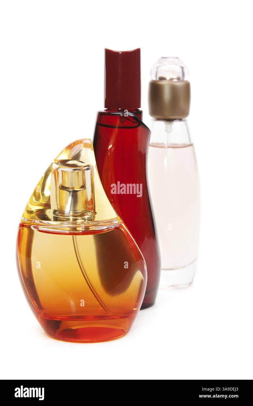 Three perfume bottle isolated on white background Stock Photo - Alamy
