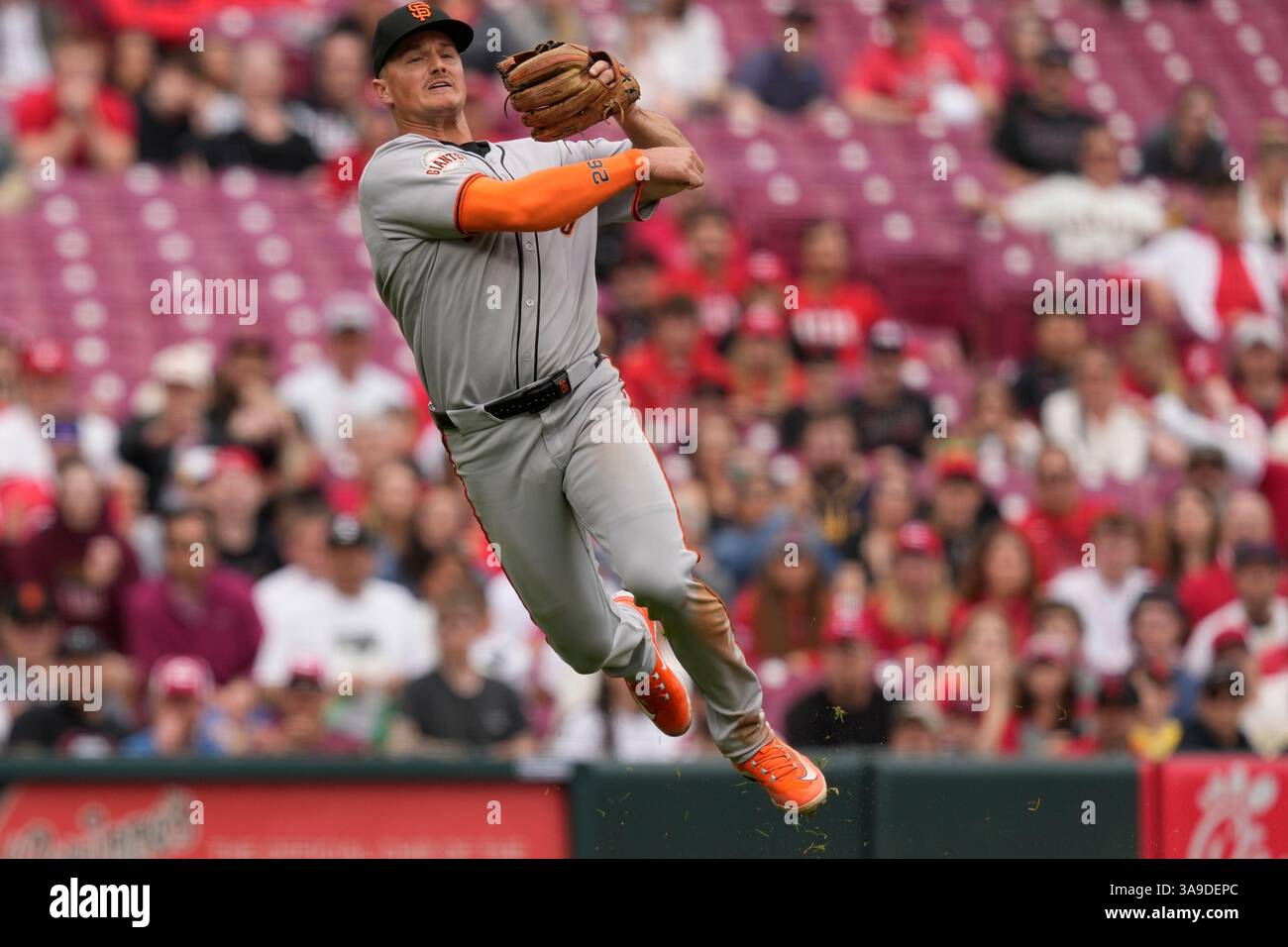 San Francisco Giants third base Matt Chapman watches his throw to first ...