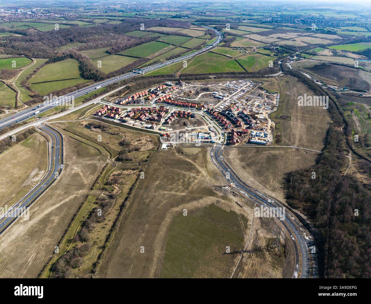 Aerial view of affordable new build houses on a construction site on ...