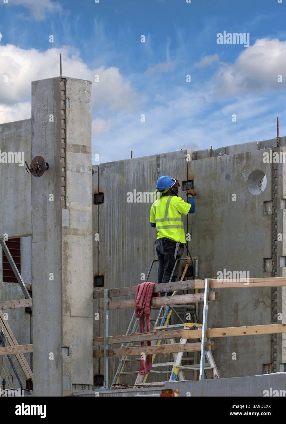 Construction working assemble iron grids into the frame ready for ...