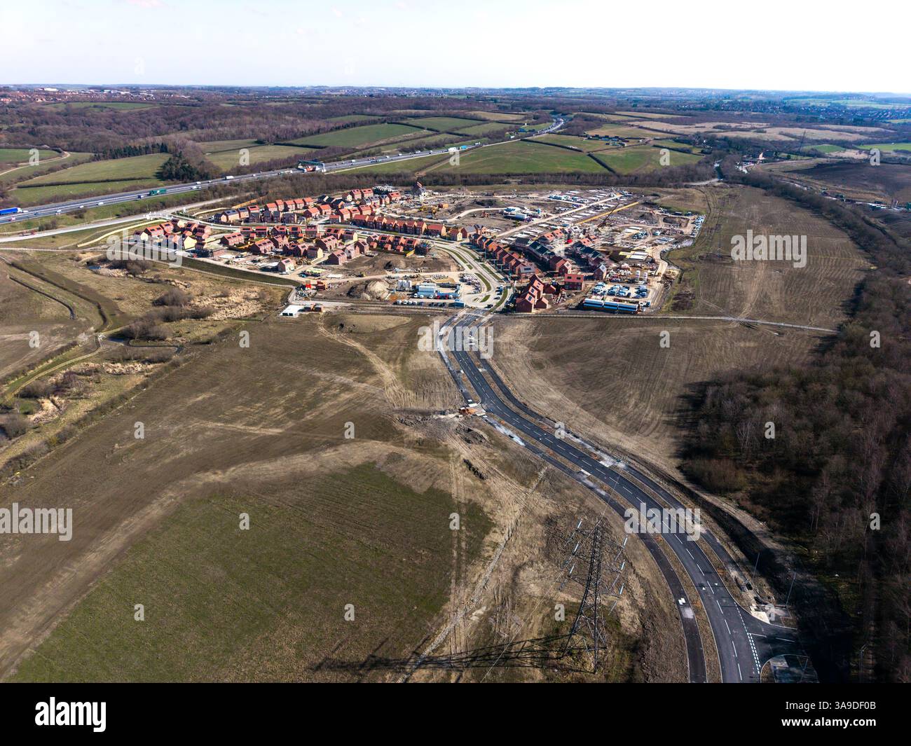 Aerial view of affordable new build houses on a construction site on ...